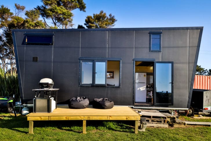 This Couple Built An All-Black Tiny House Powered By Solar Panels, And ...